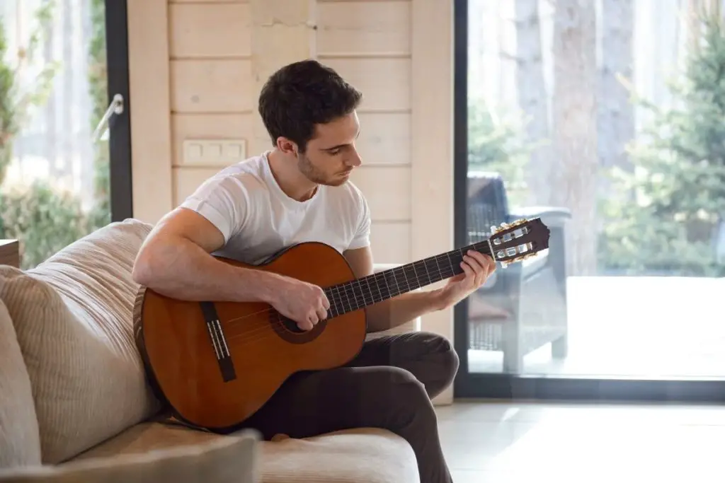 How To Play Guitar In Open D Minor Tuning - On Point Guitar