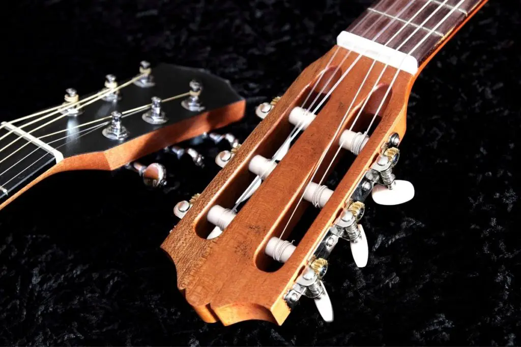 Parts Of An Acoustic Guitar: Head Stock, Tuning Keys, & More