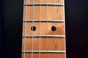 Rosewood Vs Maple Neck Fretboards: Which Is Better? - On Point Guitar