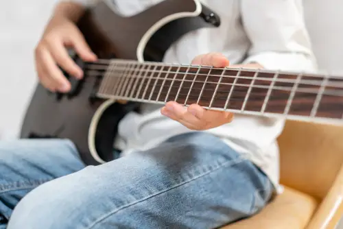 Guitar Buzzing When Not Touching Strings On Point Guitar